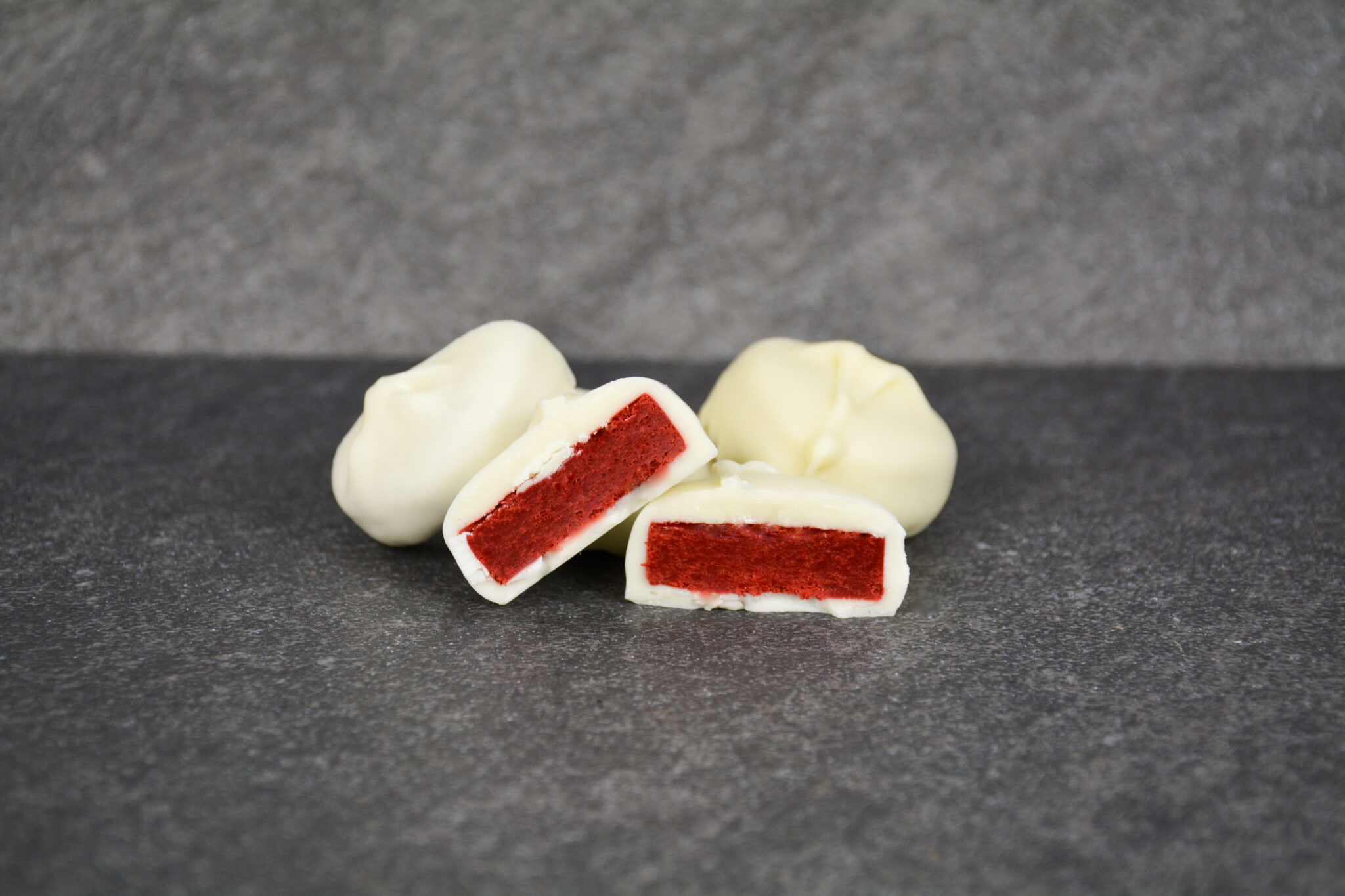 White Chocolate Covered Red Velvet Cake Truffles | Asher's Chocolate Co.